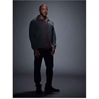 9-1-1 Rockmond Dunbar as Michael Grant Standing Tall Hands Resting at ...
