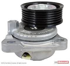 Ford, TENSION PULLEY Assembly, 6E5Z-6A228-B: Amazon.com.mx: Automotriz ...