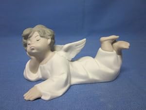 Amazon.com: Lladro Angel Laying Down Figurine: Home & Kitchen
