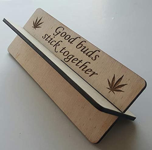 Wooden rolling up stand with slogan on ‘Good buds stick together ...