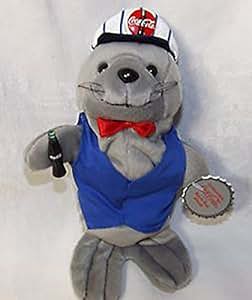 Amazon.com: Coca Cola Seal in Delivery Outfit: Toys & Games