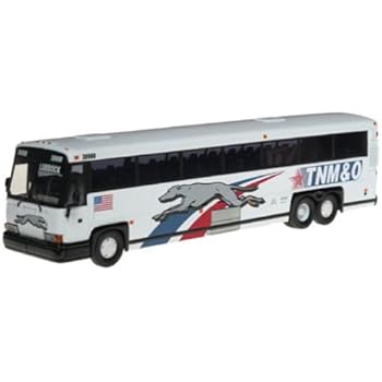 Amazon.com: Corgi MCI 102 DL3 Greyhound TNM & O Vintage Bus Lines 2002 ...