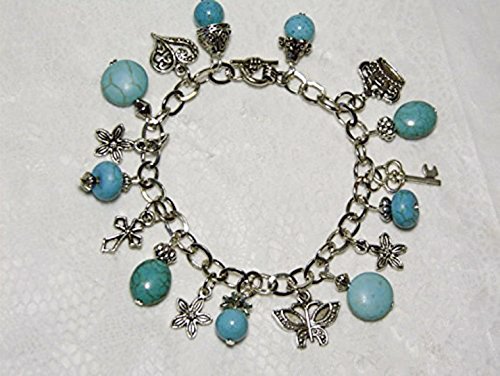 Amazon.com: Cynthia Lynn "RESURRECTION" Rhodium Silver Turquoise Cross ...