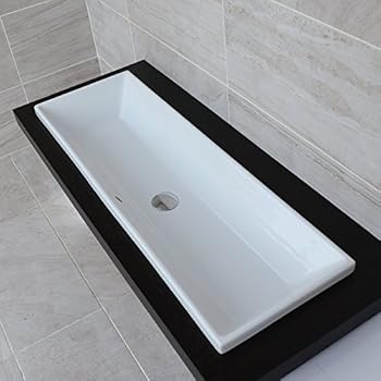 Under-counter or self-rimming porcelain lavatory with an overflow. W ...