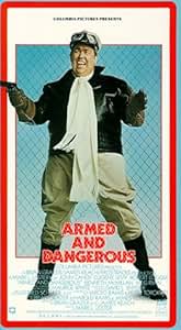 Amazon.com: Armed and Dangerous [VHS]: John Candy, Meg Ryan, Eugene ...