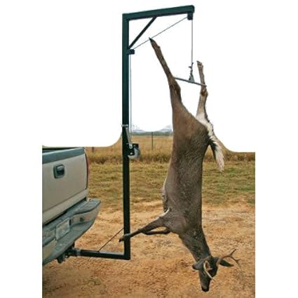 Loading deer into the bed of a truck | Arkansas Hunting