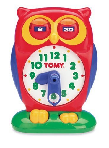 Anyone ever have the Tomy owl clock? Pressing the feet would move the ...