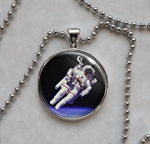 Amazon.com: Astronaut Floating in Space Pendant Necklace : Handmade ...