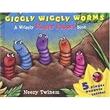 Amazon.com: Squiggly Wiggly's Surprise: A Finger Puppet Learns About ...