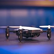 Amazon.com: SIMREX X300C Mini Drone RC Quadcopter Foldable Altitude ...