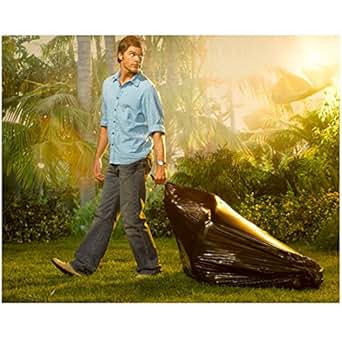 Dexter Michael C. Hall dragging a trash bag 8 x 10 Inch Photo at Amazon ...