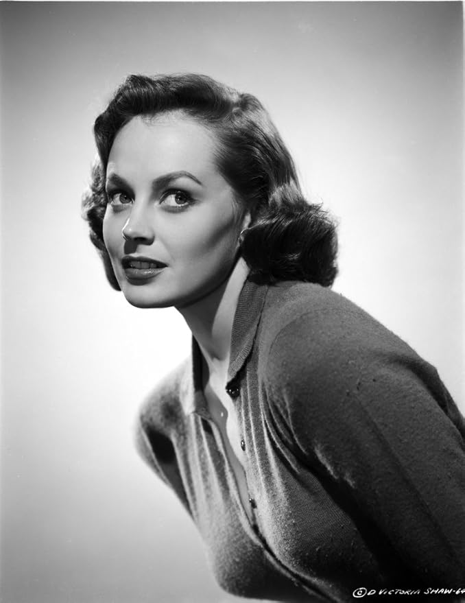 Amazon.com: Posterazzi Victoria Shaw leaning into the frame of the ...