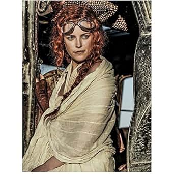 Riley Keough as Capable covered up with a robe in Mad Max: Fury Road 8 ...