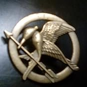 Amazon.com: The Hunger Games Movie Mockingjay Prop Rep Pin: Toys & Games