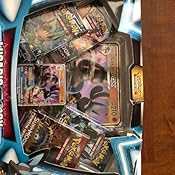 Amazon.com: Pokemon TCG: Lucario Gx Box - 4 Booster Pack + A Foil Promo ...