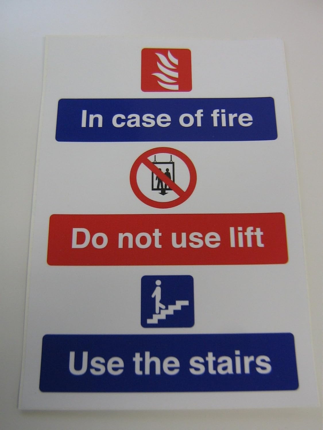 Health & Safety Signs -"in case of fire do not use Lift, use The Stairs ...