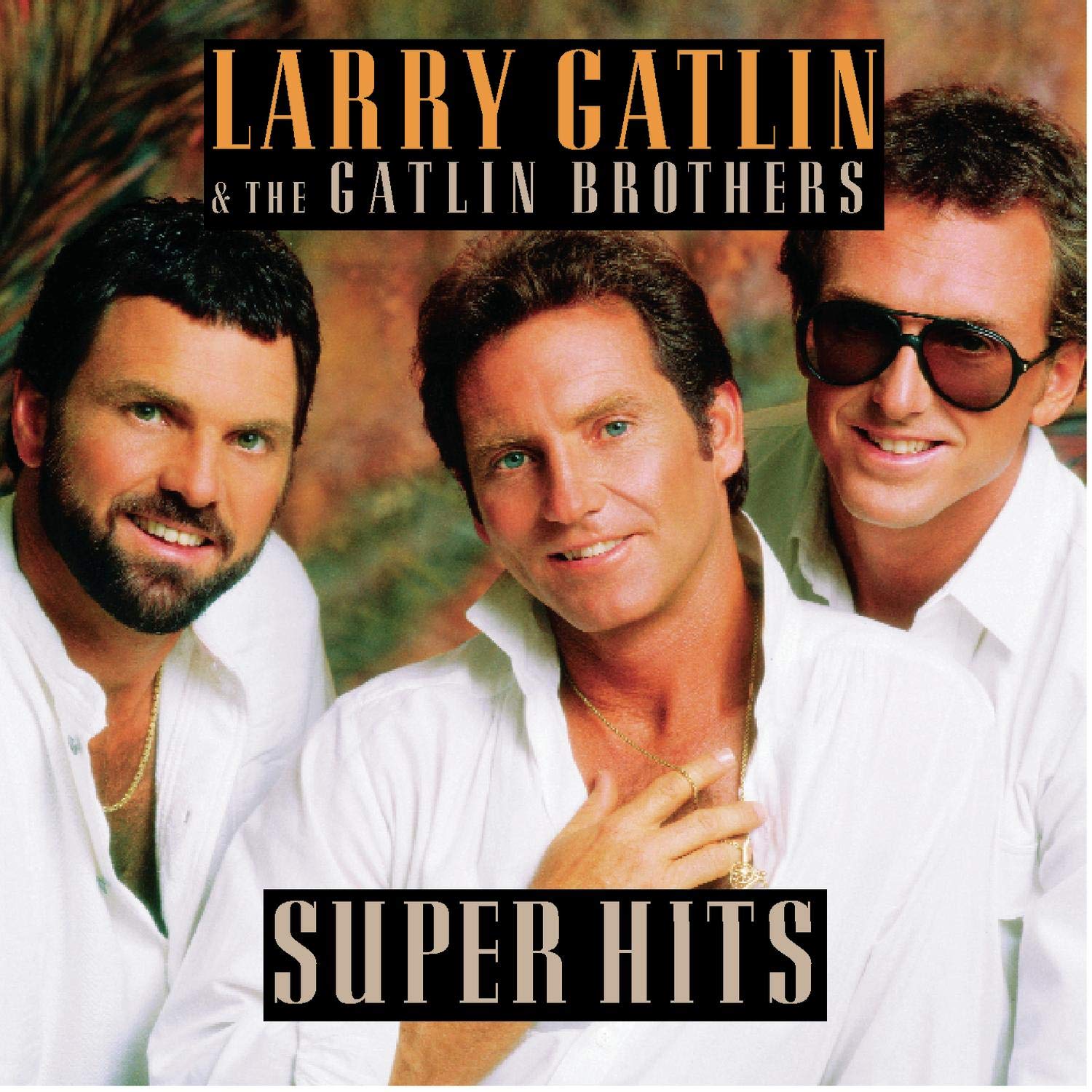 Super Hits : Larry Gatlin and the Gatlin Brothers: Amazon.fr: Musique