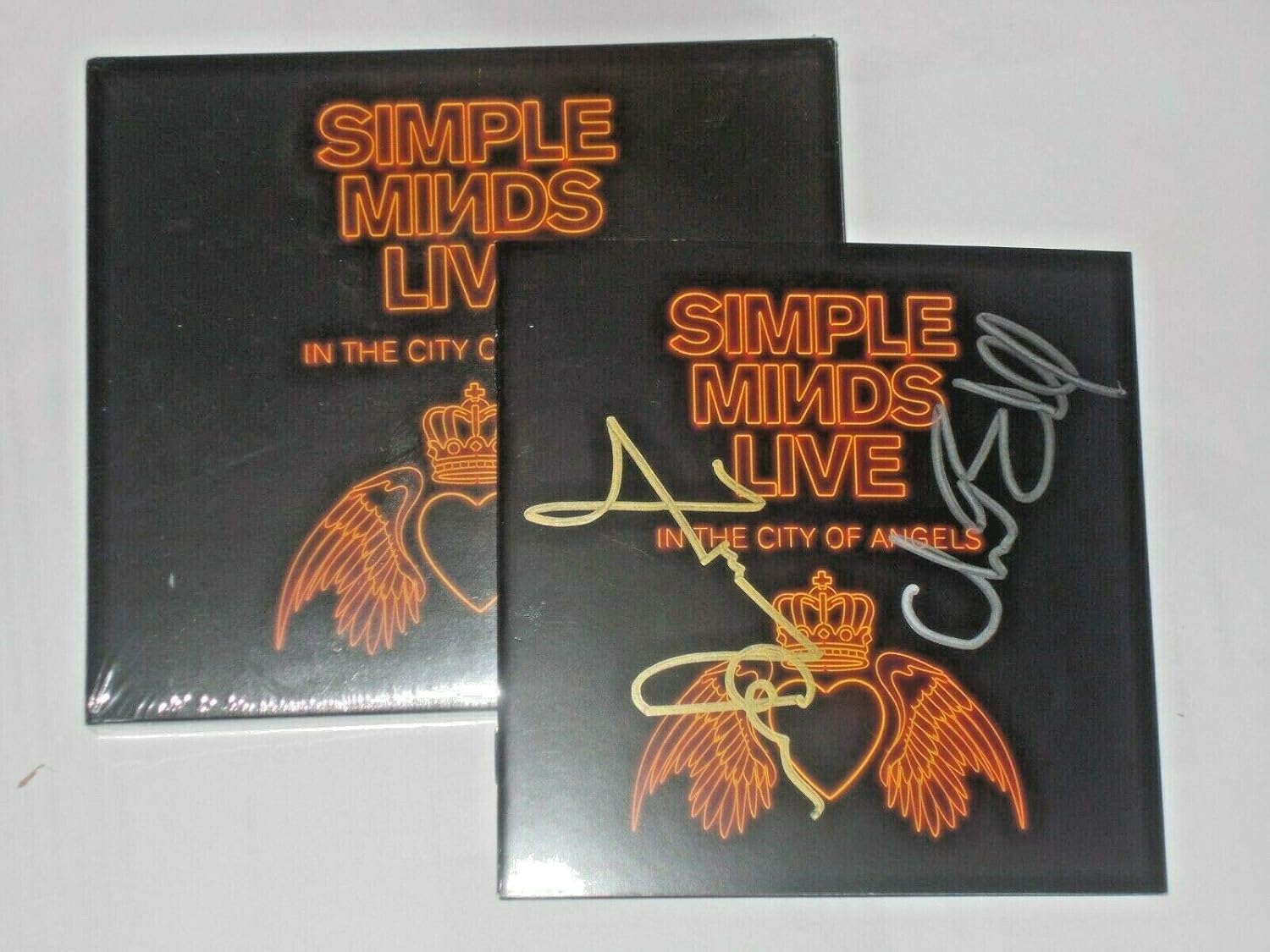 Simple Minds Live In The City Of Angels Signed 2CD by : Amazon.co.uk ...