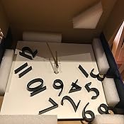 Karlsson Wall Clock Falling Numbers, Black/White Dial: Amazon.co.uk ...