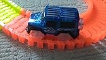 Magic Tracks 220-Piece Glow-in-the-dark Racetrack and Car Play Set ...