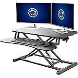 Amazon.com: STAPLES 2447503 Sit to Stand Adjustable Desk Riser 27-Inch ...