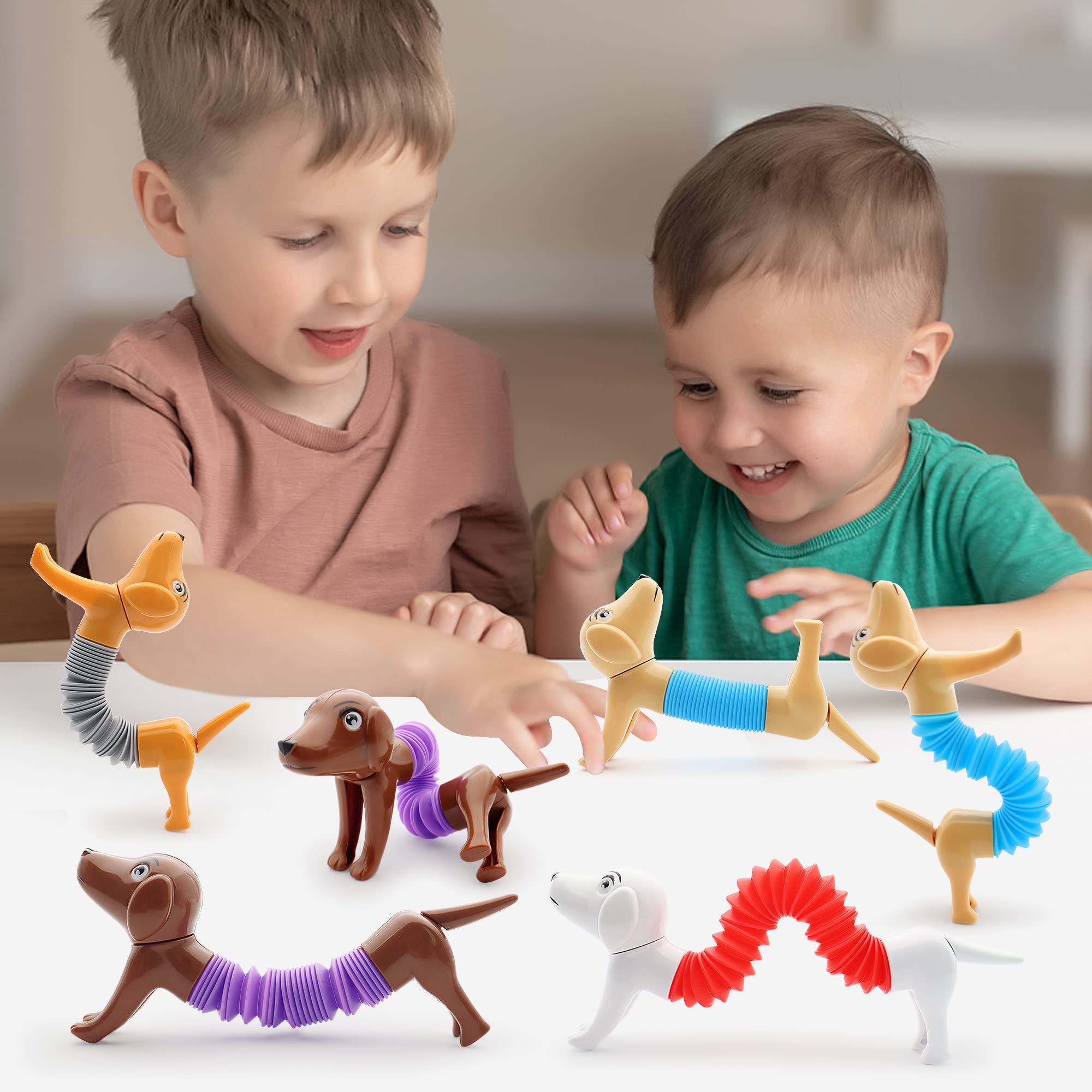 Mua KIMSTONE 2 Pieces Pop Tubes Spring Dog Fidget Toys Fine Motor ...