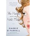 Amazon.com: The Hand That First Held Mine: A Novel: 9780547423180: O ...