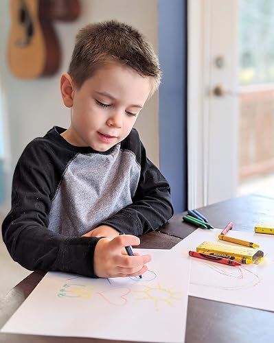 Kid Coloring With Crayons