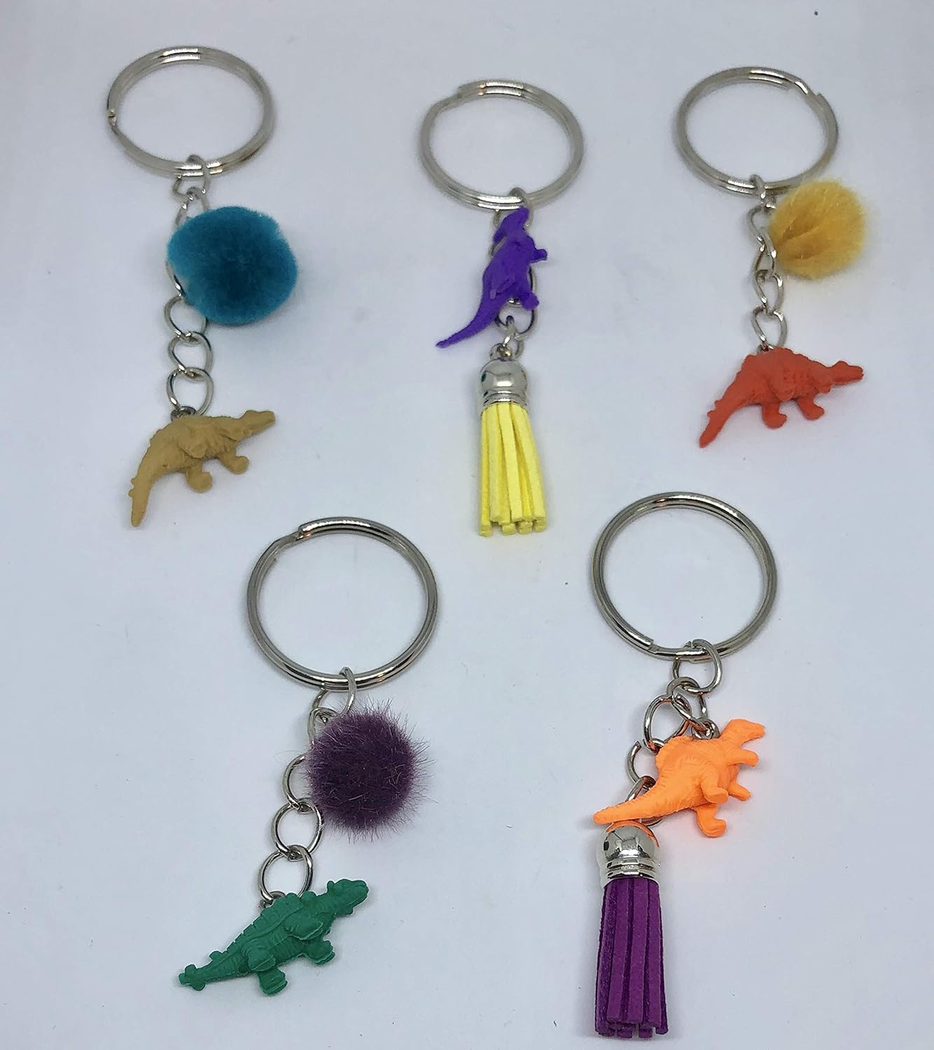 Amazon.com: Upcycled Dinosaur Toy Tassel and Pom Pom keychain - Dino ...