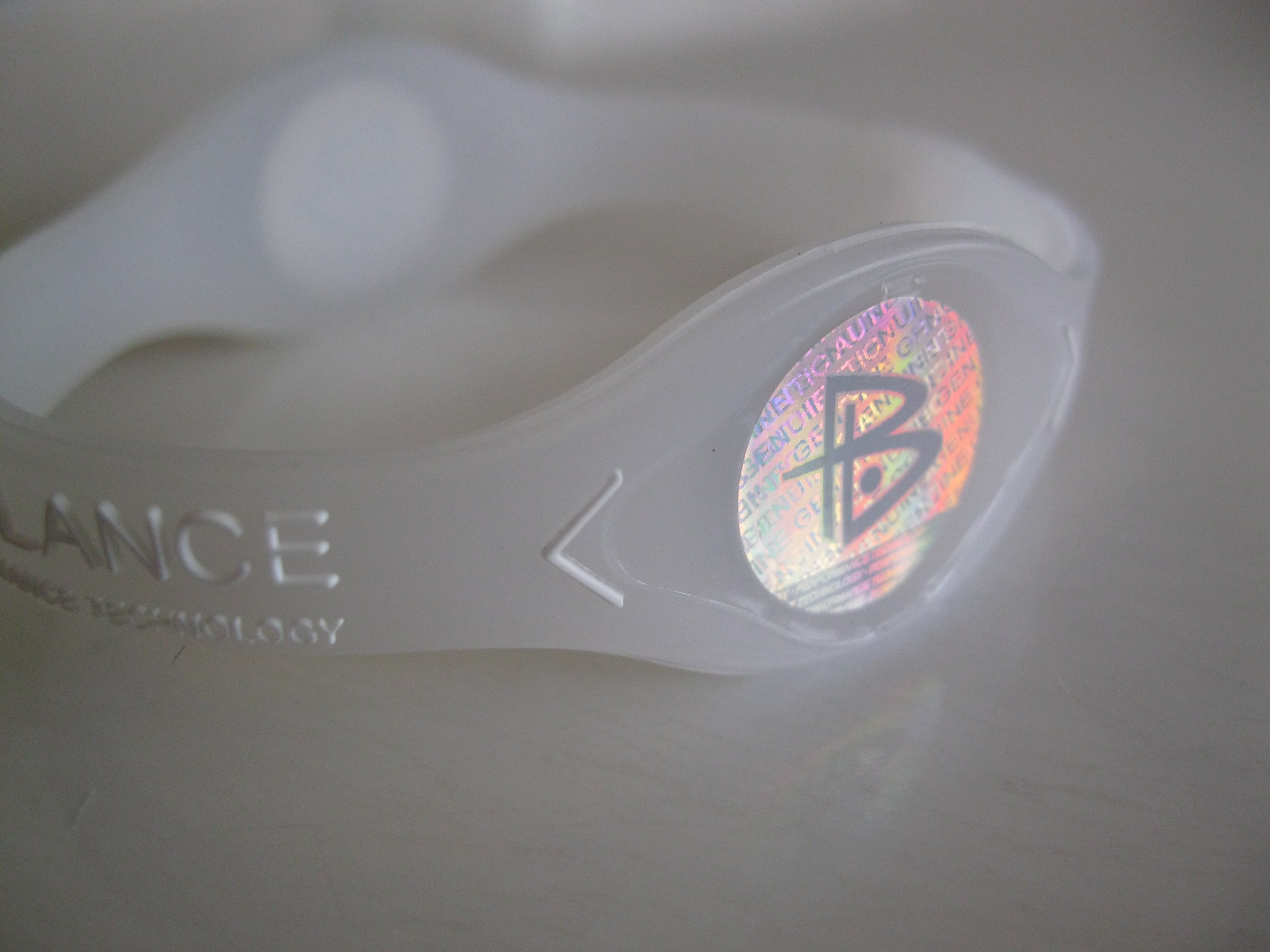 Amazon.com: - Power Balance Silicone Wristband, Clear/ Fuchsia Small ...