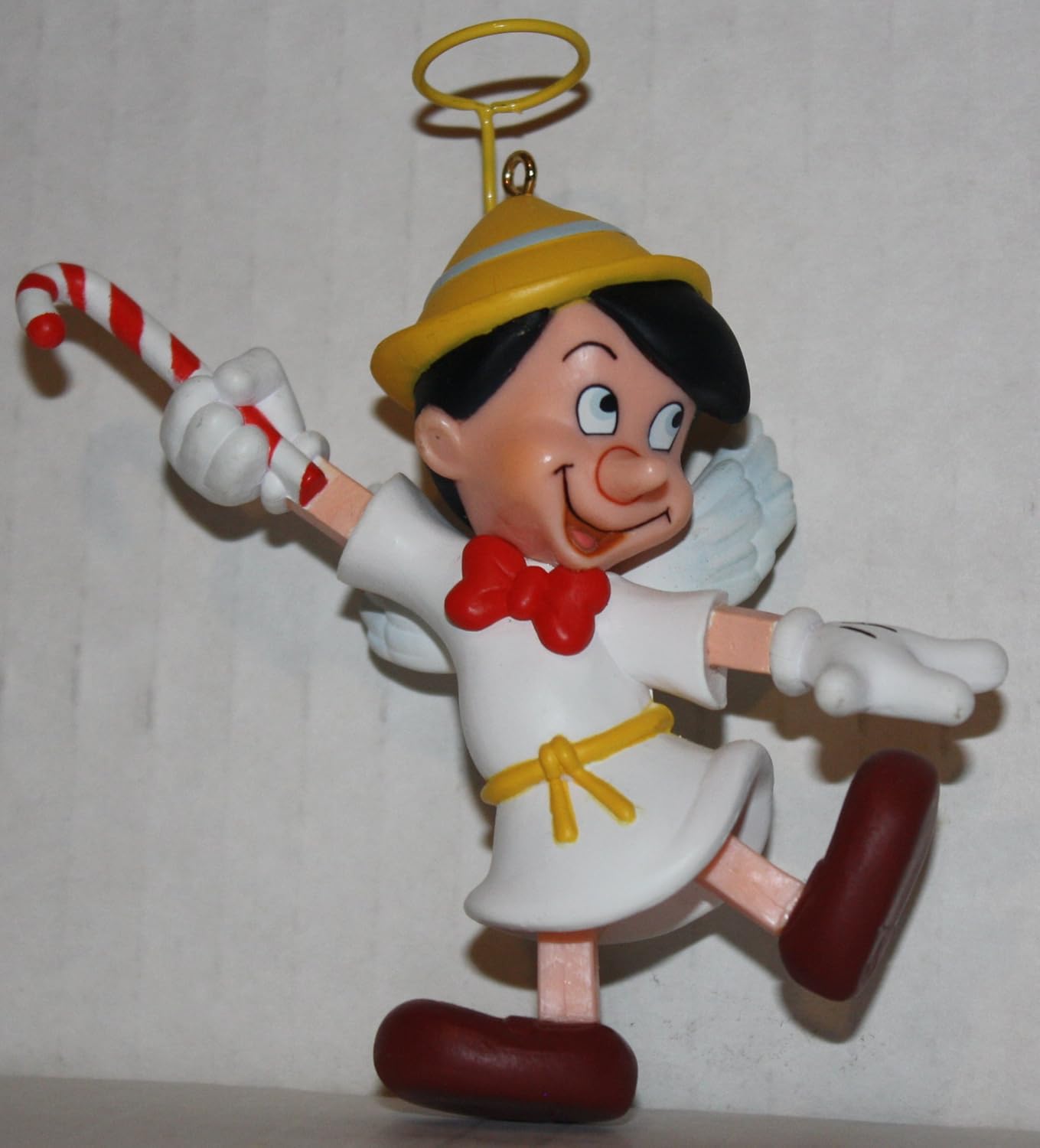 Amazon.com: Disney "Magic" Ornament: Pinocchio Angel: Home & Kitchen