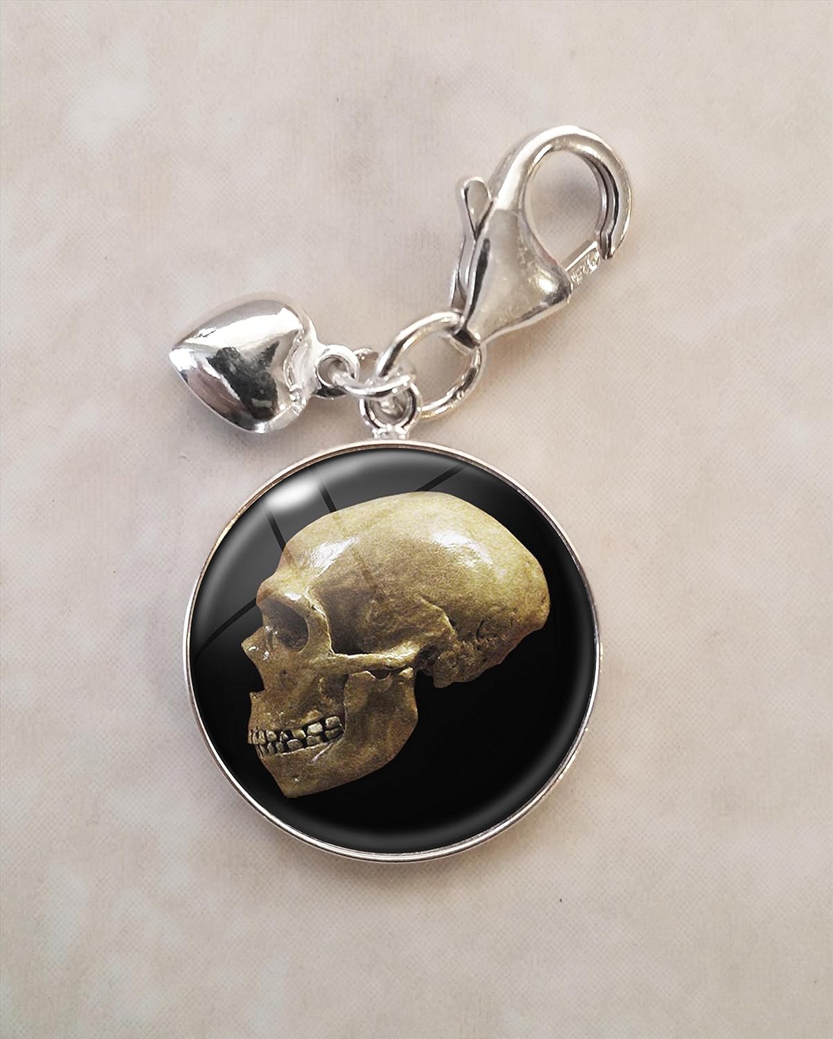Amazon.com: Neanderthal Skull .925 Sterling Silver Charm: Handmade