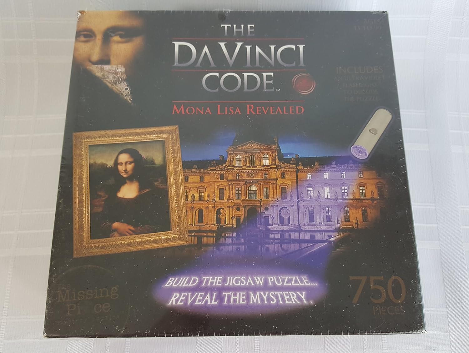 Da Vinci Code 750-Piece Mystery Puzzle With FREE UV Torch [Toy] – BigaMart