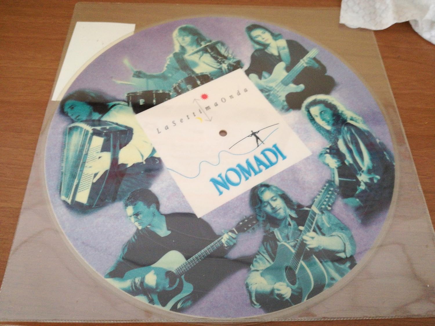 NOMADI LA SETTIMA ONDA -LP PICTURE 1994: NOMADI: Amazon.it: CD e Vinili}