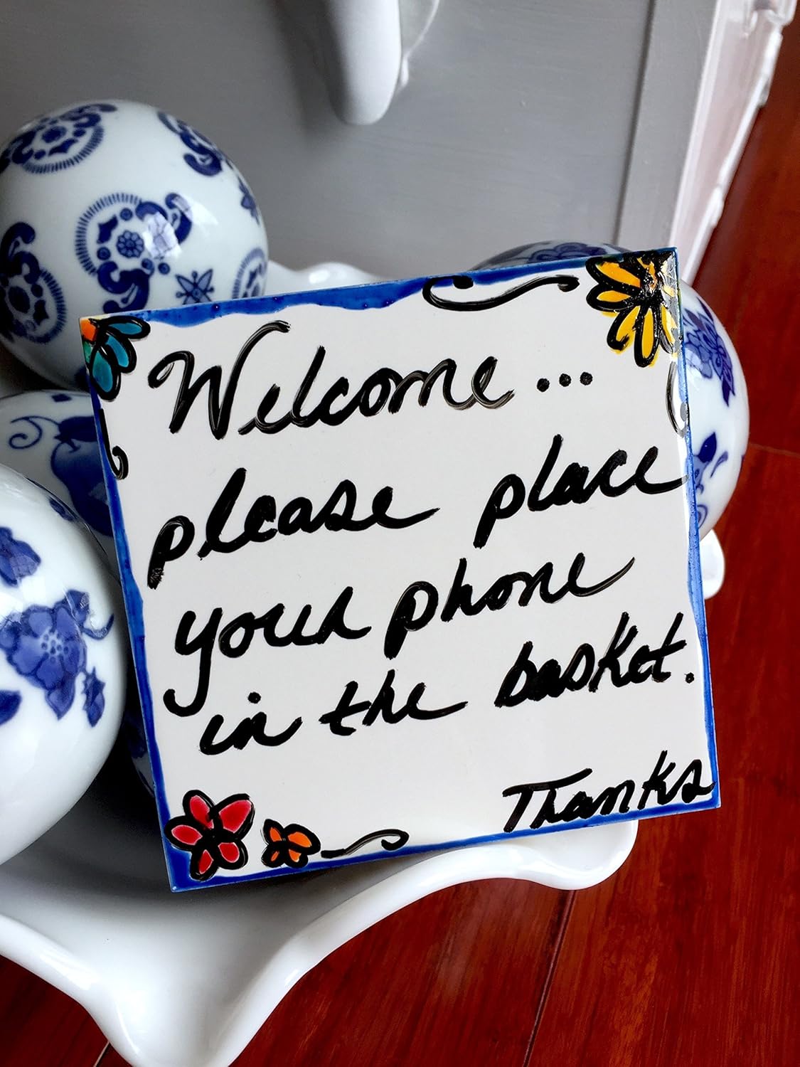 Amazon.com: "Welcome...Please place your cell phone in the basket ...