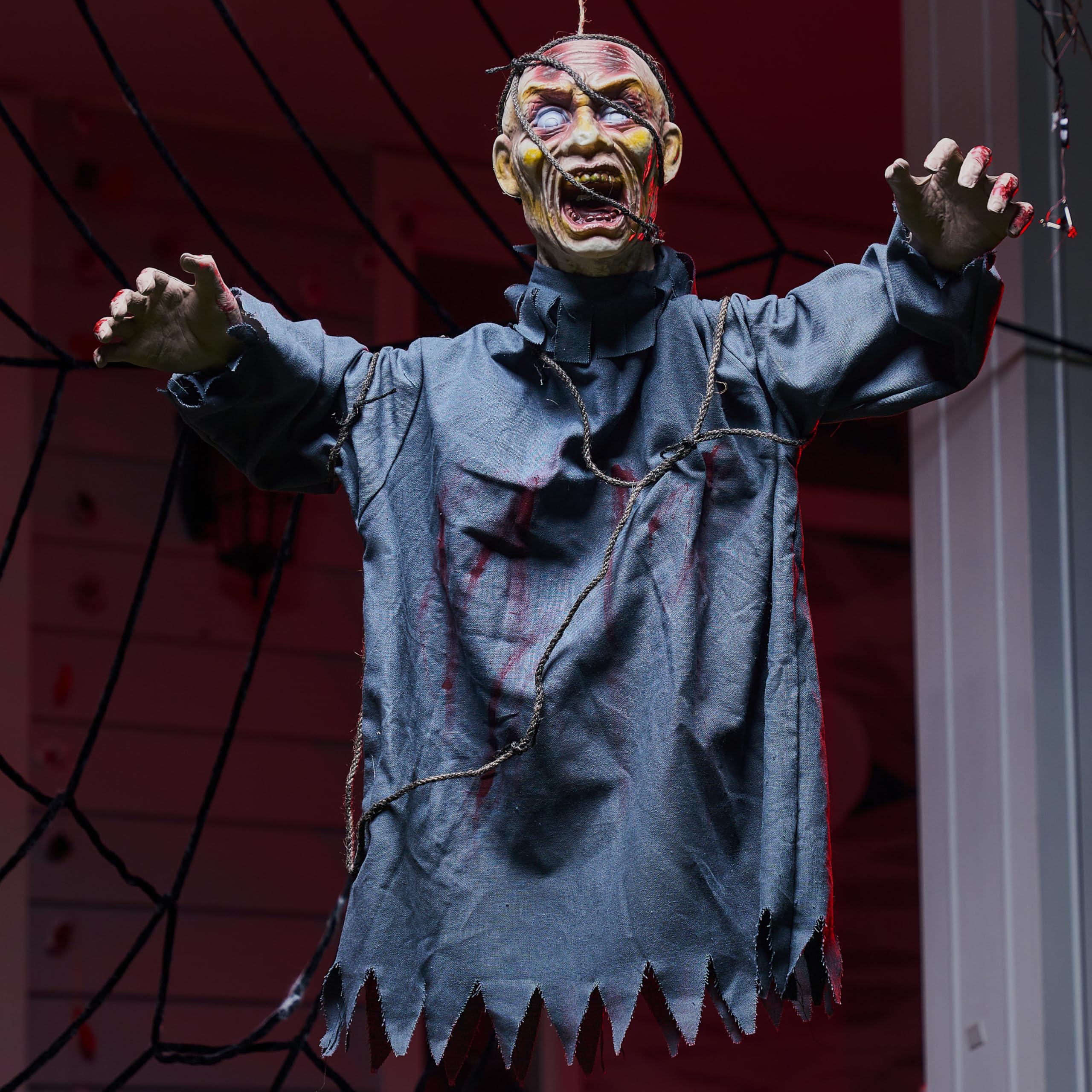 JOYIN 30” Halloween Hanging Zombie, Plastic Creepy Zombie with Web for ...