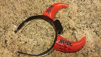 * ANGUS YOUNG - AC/DC * signed lighted devil horns (sold at concert ...