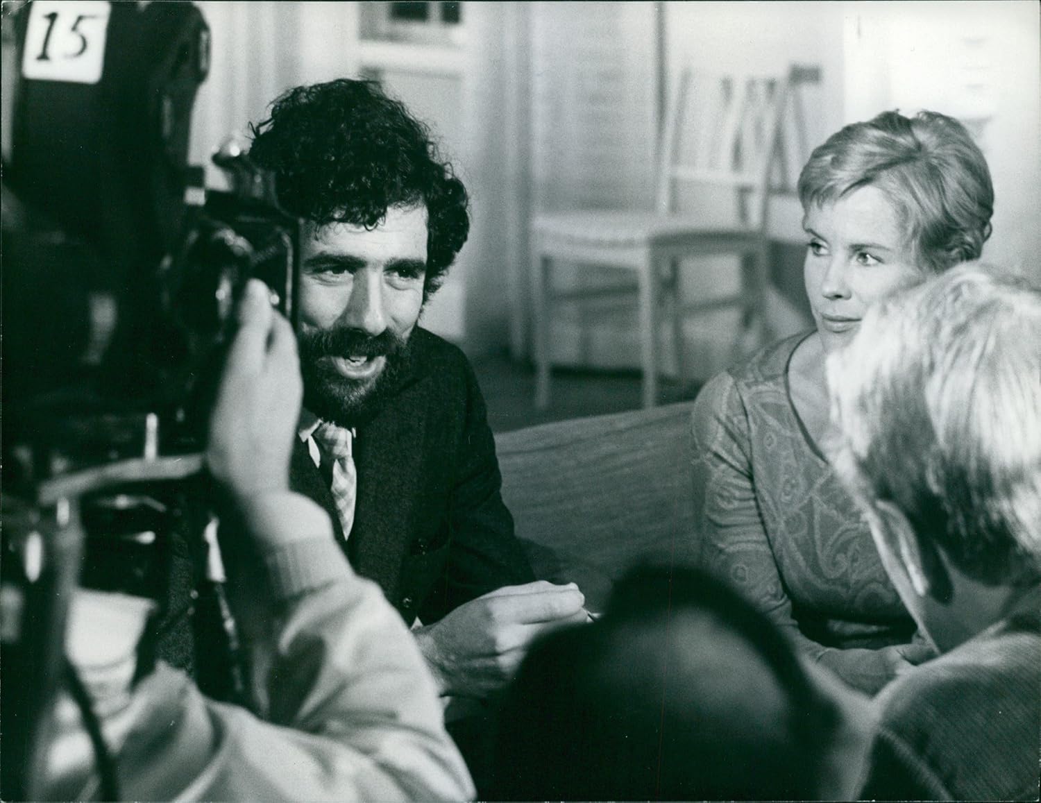 Amazon.com: Vintage photo of A man is being interview while a woman is ...