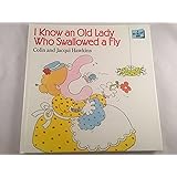 Amazon.com: I Know an Old Lady Who Swallowed a Fly: 9780439573306: Mary ...