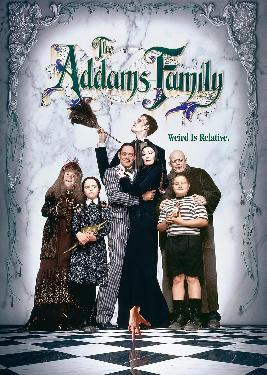 Amazon.com: The Addams Family: Anjelica Huston, Raul Julia, Christopher ...