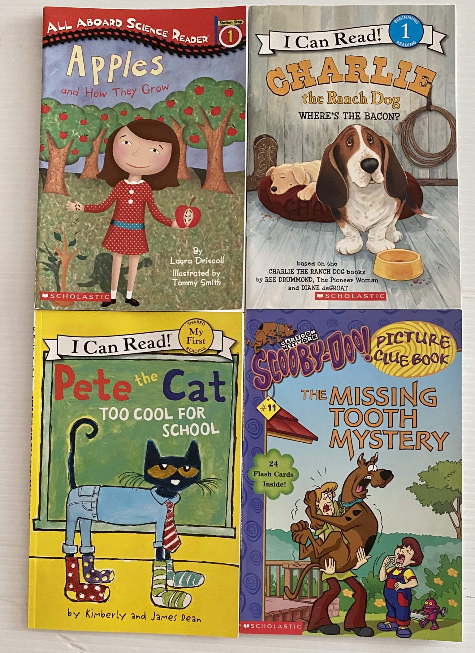 4 Level 1 Books! 1) Apples and How They Grow 2) Charlie The Ranch Dog ...
