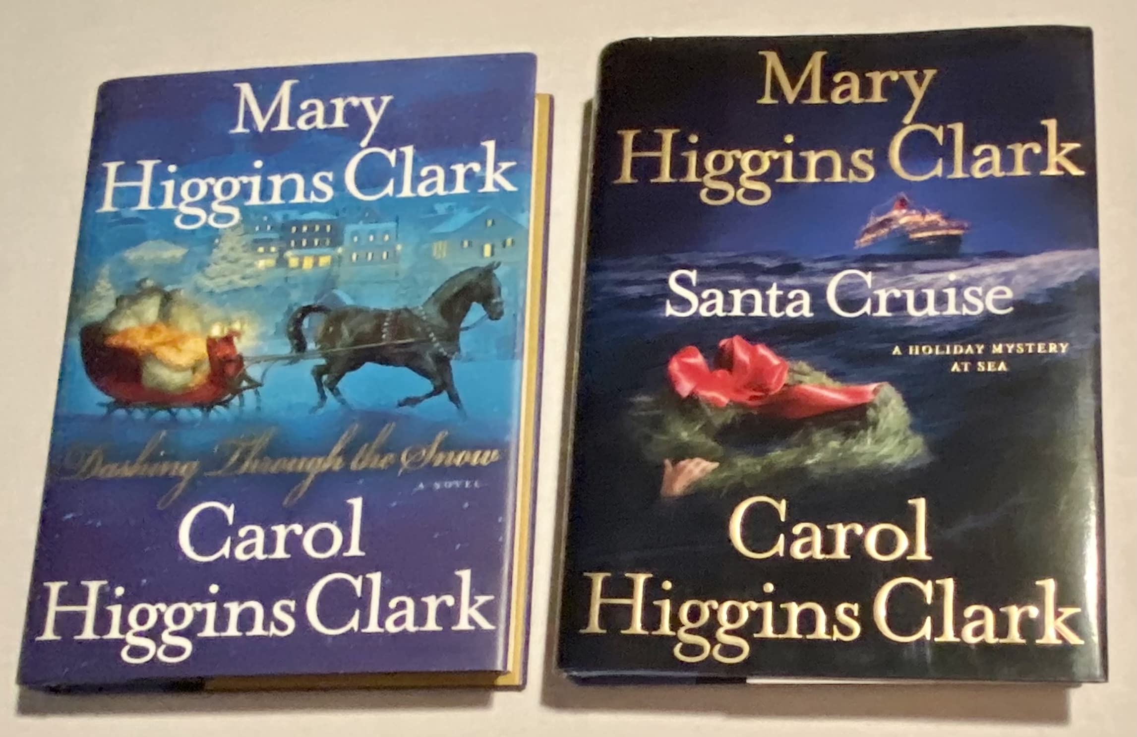 2 Carol Higgins Clark Books! 1) Dashing Through the Snow 2) Deck the ...